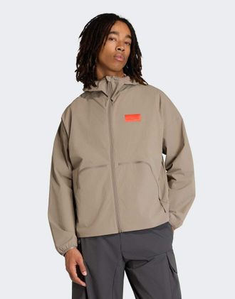 adidas adidas Performance - Audi Formula One Team Elevated - Jacke aus Webstoff in Simple Brown/Hi-Res-Rot