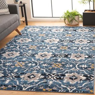 Safavieh Tapis bohème sud-Ouest pour Salon, Salle à Manger, Chambre à Coucher - Collection Amsterdam - Poils Courts - Bleu et crème - 155 x 229 cm