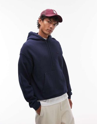 Lacoste Kapuzenpullover in Marineblau mit farblich abgestimmtem Logo