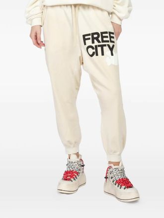 Freecity logo-print track pants - Tons neutres