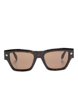 Alexander McQueen Eyewear lunettes de soleil rondes à détail de rivets - Marron
