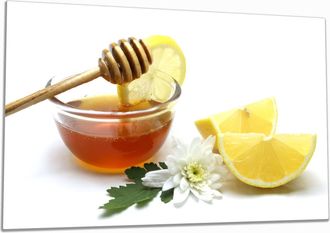 Wallario Herdabdeckplatte/Spritzschutz aus Glas, 1-teilig, 80x52cm mit 8 mm hohen Füßen, für Ceran- und Induktionsherde, Honig mit Honglöffel und Zitronen