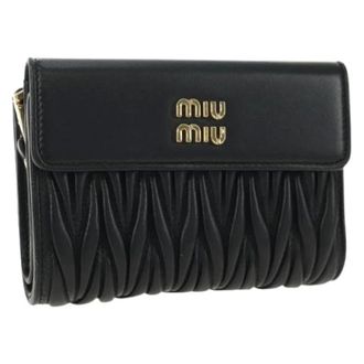Miu Miu Portefeuille en cuir pr&eacute;-poss&eacute;d&eacute; - Femme - Pre-owned - Noir - Taille: ONE Size