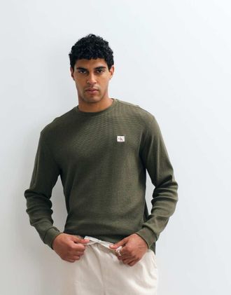 Calvin Klein Jeans T-shirt gaufr&eacute; &agrave; manches longues et &eacute;tiquette tiss&eacute;e - Kaki-Vert