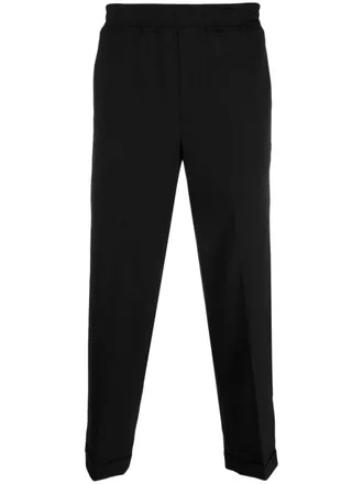Neil Barrett pantalon fusel&eacute; &agrave; taille &eacute;lastiqu&eacute;e - Noir