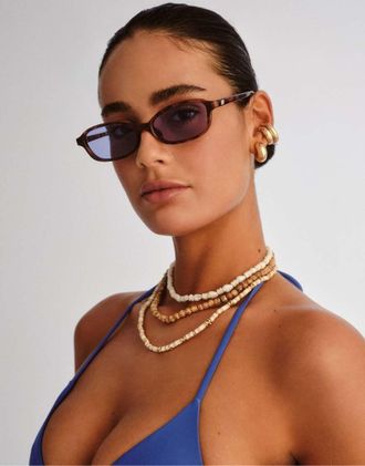 Le Specs Honey Pot - Schmale, rechteckige Sonnenbrille in Schildpatt-Optik mit blau get&ouml;nten Gl&auml;sern-Brown