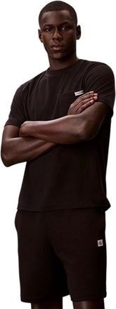 Calvin Klein Homme, Sport, Noir, Taille: XS Short de jogging en molleton de coton avec badge