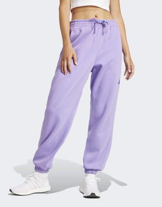 adidas adidas Performance - Essentials - Pantalon en tissu &eacute;ponge resserr&eacute; aux chevilles &agrave; 3 bandes - Noir et blanc