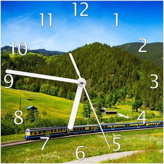 Wallario Design-Wanduhr Eisenbahn in Einer Sommerlandschaft in der Schweiz aus Glas, Motiv-Uhr Gr&ouml;&szlig;e 20 x 20 cm, wei&szlig;e Zeiger