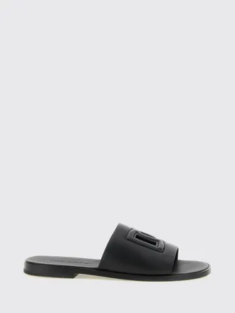 Dolce & Gabbana Mules plates en cuir de veau avec monogramme DG d&eacute;coup&eacute;