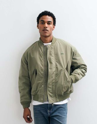 Lacoste wasserabweisende wattierte Bomberjacke in Khaki-Gr&uuml;n