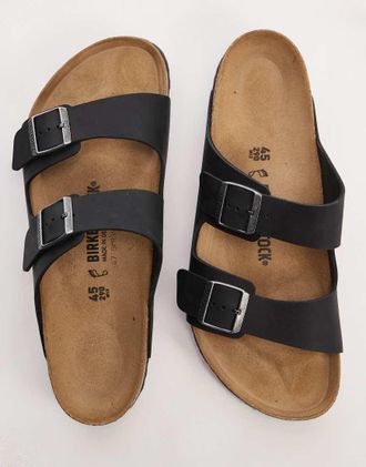 Birkenstock Arizona - Sandalen aus ge&ouml;ltem Leder in Schwarz