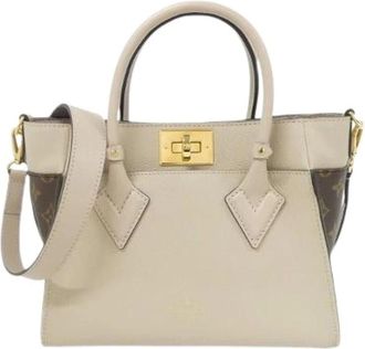 Louis Vuitton Sac bandouli&egrave;re On My Side en cuir de veau Pre-owned - Femme - Pre-owned - Beige - Taille: ONE Size