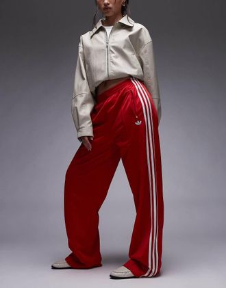 adidas Originals Firebird - Pantalon de surv&ecirc;tement ample - Rouge et blanc