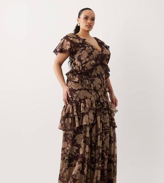 Asos Curve ASOS DESIGN Curve- Robe longue fluide et volant&eacute;e &agrave; imprim&eacute; fleuri avec bords fantaisie et dos ouvert - Marron-Multicolore