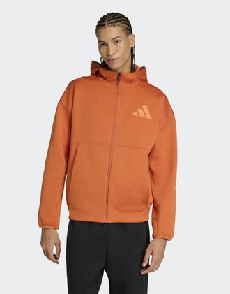adidas adidas Performance - Z.N.E - Veste de surv&ecirc;tement zipp&eacute;e &agrave; capuche - Orange renard