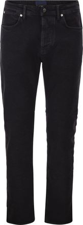 Stone Island Jean slim &agrave; cinq poches avec finition rinc&eacute;e