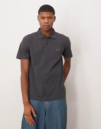 Calvin Klein Jeans Polo avec écusson à logo - Noir