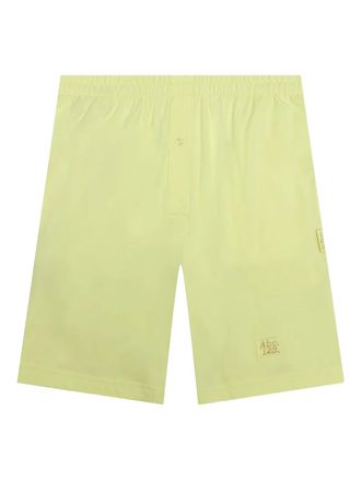 Advisory Board Crystals short taille élastiqu à patch logo - Jaune