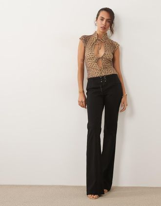 I.AM.GIA Seraya - Pantalon large en tissu stretch avec taille mi-haute et lacets - Noir
