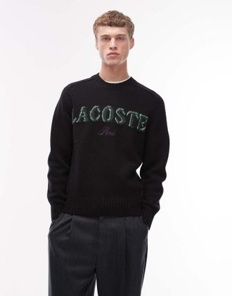 Lacoste Pullover in Schwarz mit beflocktem Logo und Rundhalsausschnitt