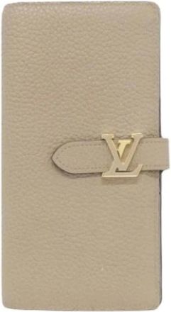 Louis Vuitton Portefeuille Vertical Louis Vuitton Pre-owned en cuir de veau Taurillon - Femme - Pre-owned - Beige - Taille: ONE Size