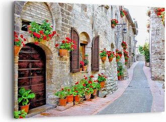 Arttor Bilder auf Leinwand 100x70cm Leinwandbild Italien Straße Blumen Geschichte Groß Wanddeko Bild Schlafzimmer Deko Wandbilder Dekoration Wohnzimmer Wall 