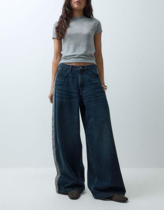 Collusion X007 jean baggy taille basse &agrave; d&eacute;lavage fonc&eacute; avec bordure sportive-bleu marine