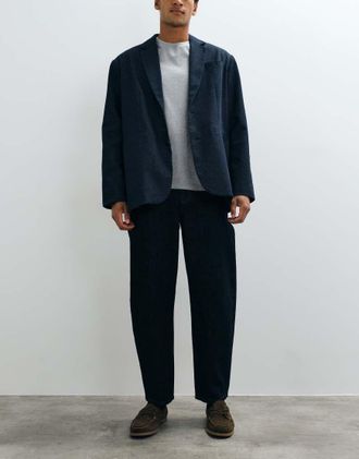 Asos Jean barrel d&eacute;contract&eacute; en denim surpiqu&eacute; de qualit&eacute; sup&eacute;rieure - Indigo-Bleu