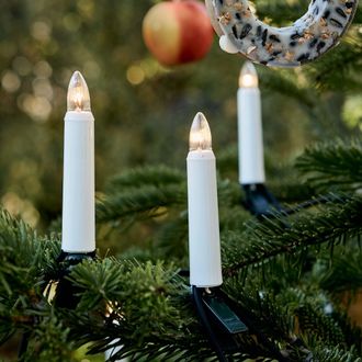Hellum Lichterkette Weihnachtsbaum, Made in Germany, Baumkerzen mit Clip, 20 Lichter, beleuchtete Länge 19 m, Kabel schwarz, warmweiß, Schaft weiß, für Außen
