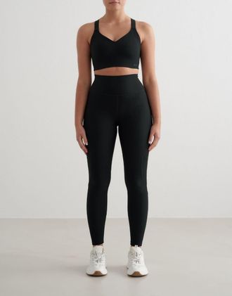 Aim'n Performance - Legging de sport c&ocirc;tel&eacute; avec poche - Noir