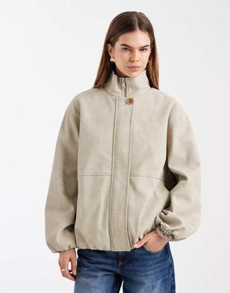 Asos ASOS - Veste oversize en similicuir &agrave; col chemin&eacute;e et ourlet bouffant - Taupe-Noir