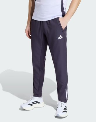 adidas adidas Performance - Manchester United Tiro 25 Competition - Pantalon de pr&eacute;sentation - Noir aurore/violet teint&eacute;