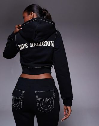 True Religion Big T - Cropped-Kapuzenjacke in Schwarz mit Rei&szlig;verschluss und Kontrastn&auml;hten, Kombiteil