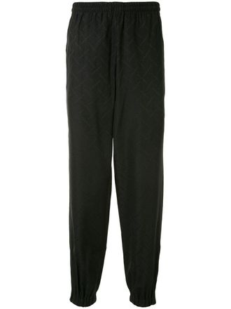 Marcelo Burlon pantalon de jogging &agrave; motif monogramm&eacute; - 1010 BLACK BLACK