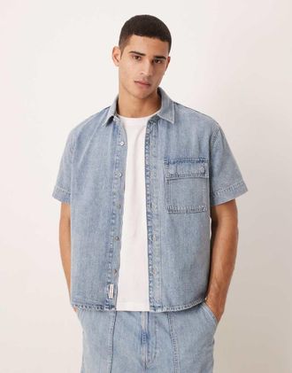 Calvin Klein Jeans Chemise densemble &agrave; manches courtes en denim de lin m&eacute;lang&eacute; - Bleu clair d&eacute;lav&eacute;