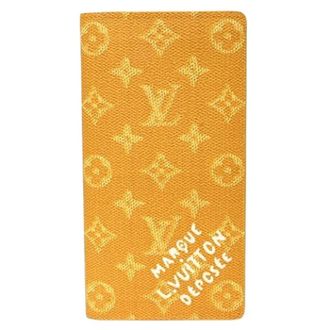 Louis Vuitton Portefeuille long pr&eacute;-poss&eacute;d&eacute; Monogram (bi-pli) - Femme - Pre-owned - Jaune - Taille: ONE Size
