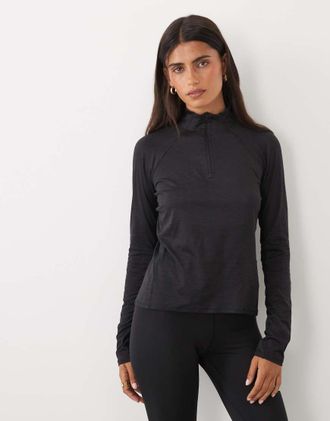 The North Face polaire Jaida &agrave; demi-zip en noir chin&eacute;