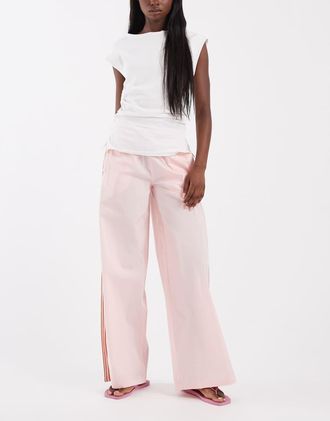 adidas Originals Pantalon de surv&ecirc;tement &agrave; 3 bandes au crochet - Rose clair