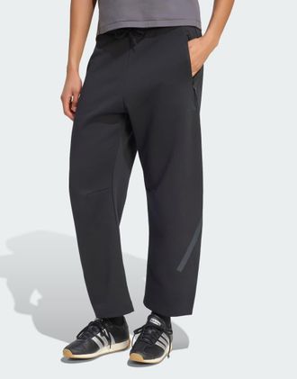 adidas adidas Performance - Z.N.E. - Pantalon avec ourlet ouvert - Noir