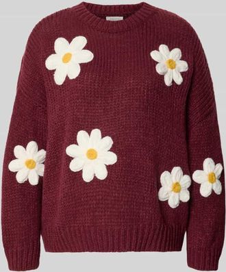 Apricot Oversized Strickpullover mit floralen Stitchings