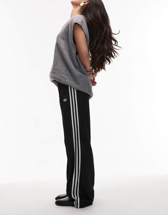 adidas Originals Firebird - Pantalon de surv&ecirc;tement ample - Noir et blanc