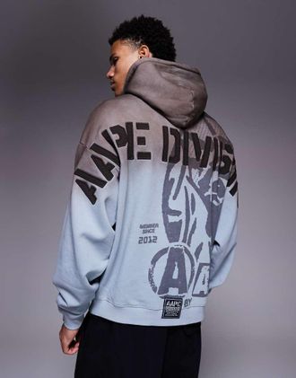 Aape By A Bathing Ape Aape By A Bathing Ape - Sweat &agrave; capuche oversize &agrave; enfiler avec broderie au dos - Bleu d&eacute;lav&eacute;