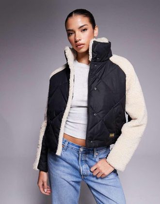 Barbour Veste matelass&eacute;e oversize &agrave; manches en polaire - Noir et beige