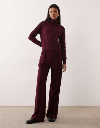 adidas Originals Firebird - Pantalon de surv&ecirc;tement &agrave; dentelle - Bordeaux-Rouge