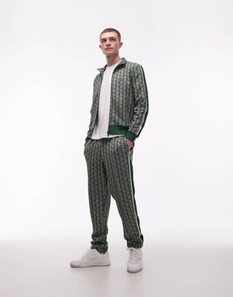 Lacoste Pantalon de surv&ecirc;tement droit &agrave; monogramme - Vert