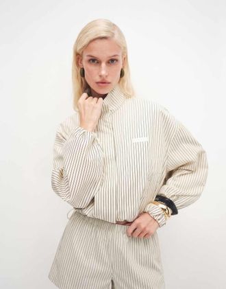 Cernucci Nylon-Jacke mit Streifen und Stehkragen als Kombiteil in Buttergelb