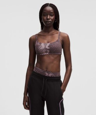 lululemon Wunder Train Racerback-BH mit leichtem Halt f&uuml;r A/B-Cups SLNSH Kollektion f&uuml;r Frauen - Gr&ouml;&szlig;e 12 in From Afar Black Sable Verbena