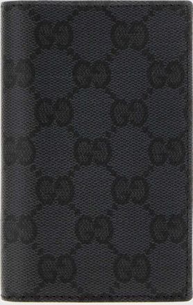 Gucci Porte-cartes bifold Essence en toile Supr&ecirc;me GG