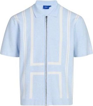 H&eacute;las. Polo zip &agrave; manches courtes